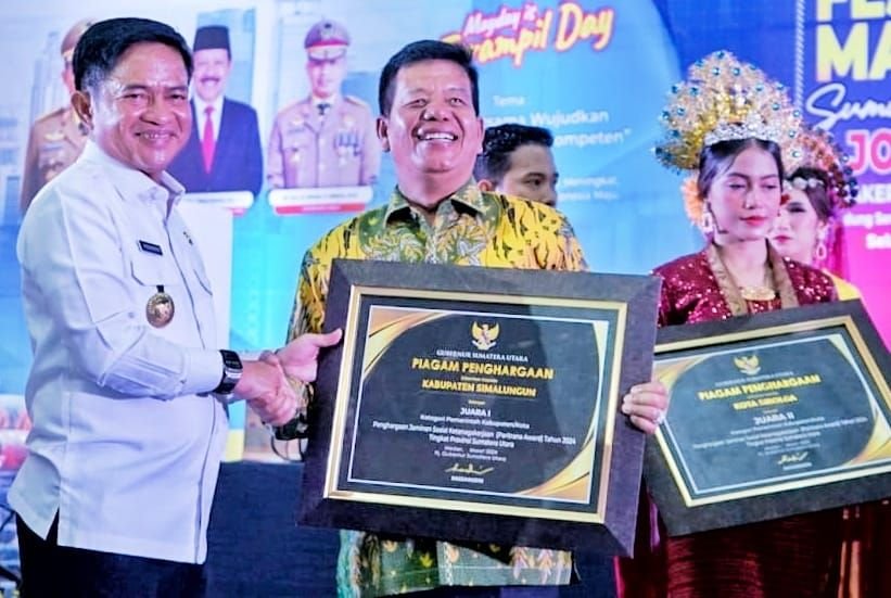 Bupati Simalungun Terima Penghargaan Paritrana Award 2024